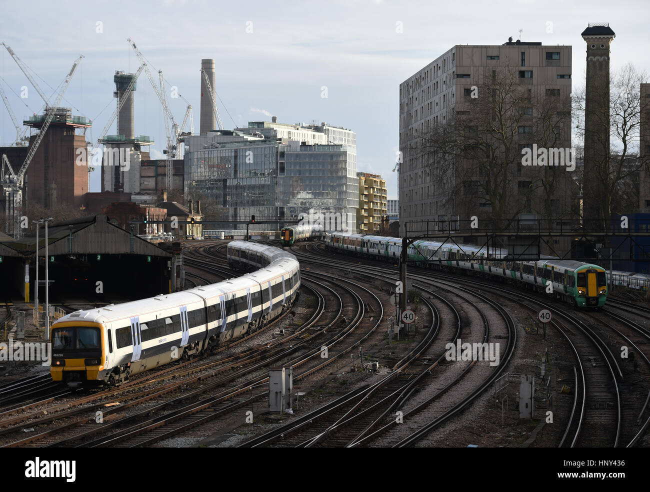 Southern rail (right) and a Southeastern train at Victoria Station in ...