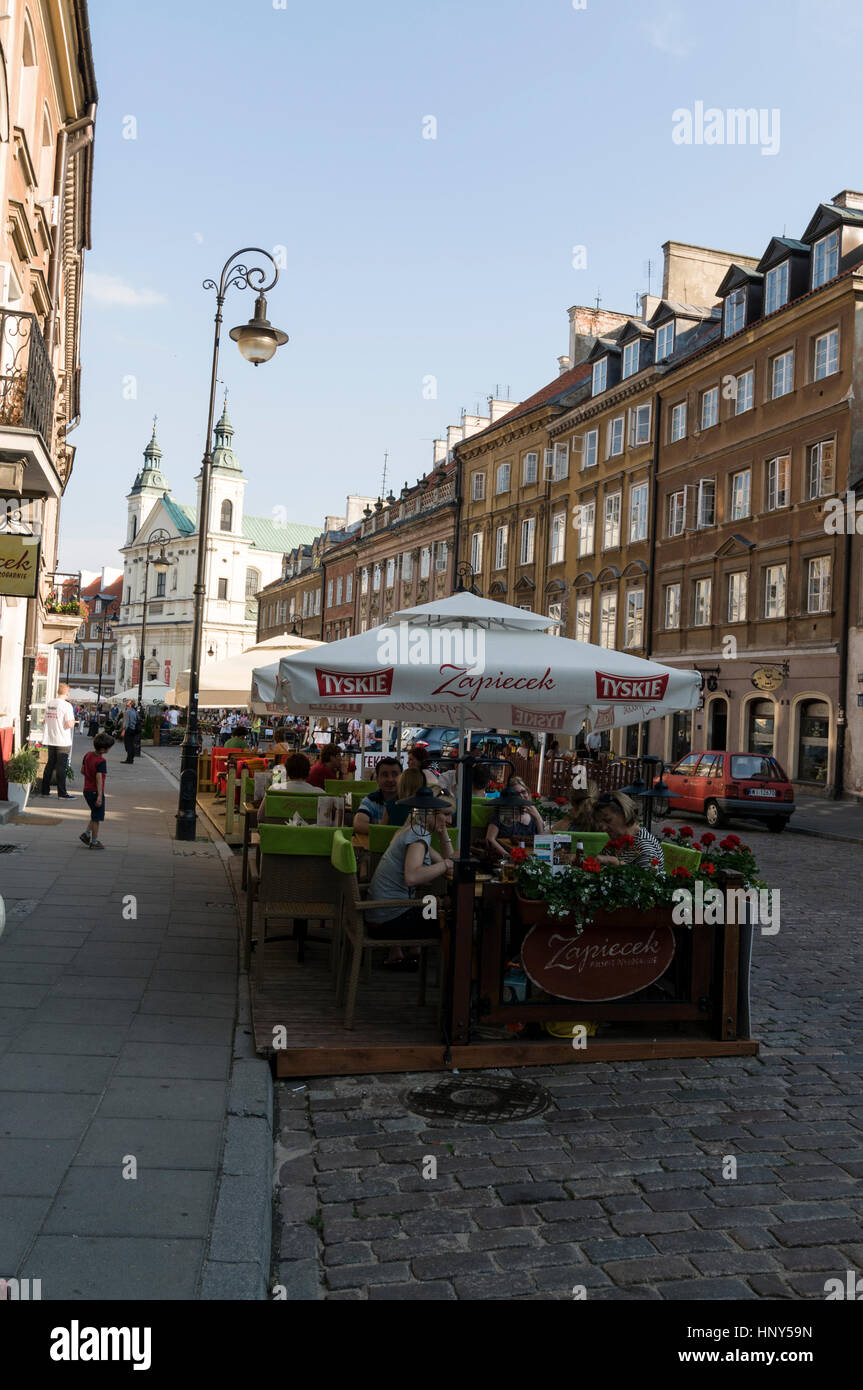 Outside restaurants in the main thoroughfare, Freta Nowomiejska in ...