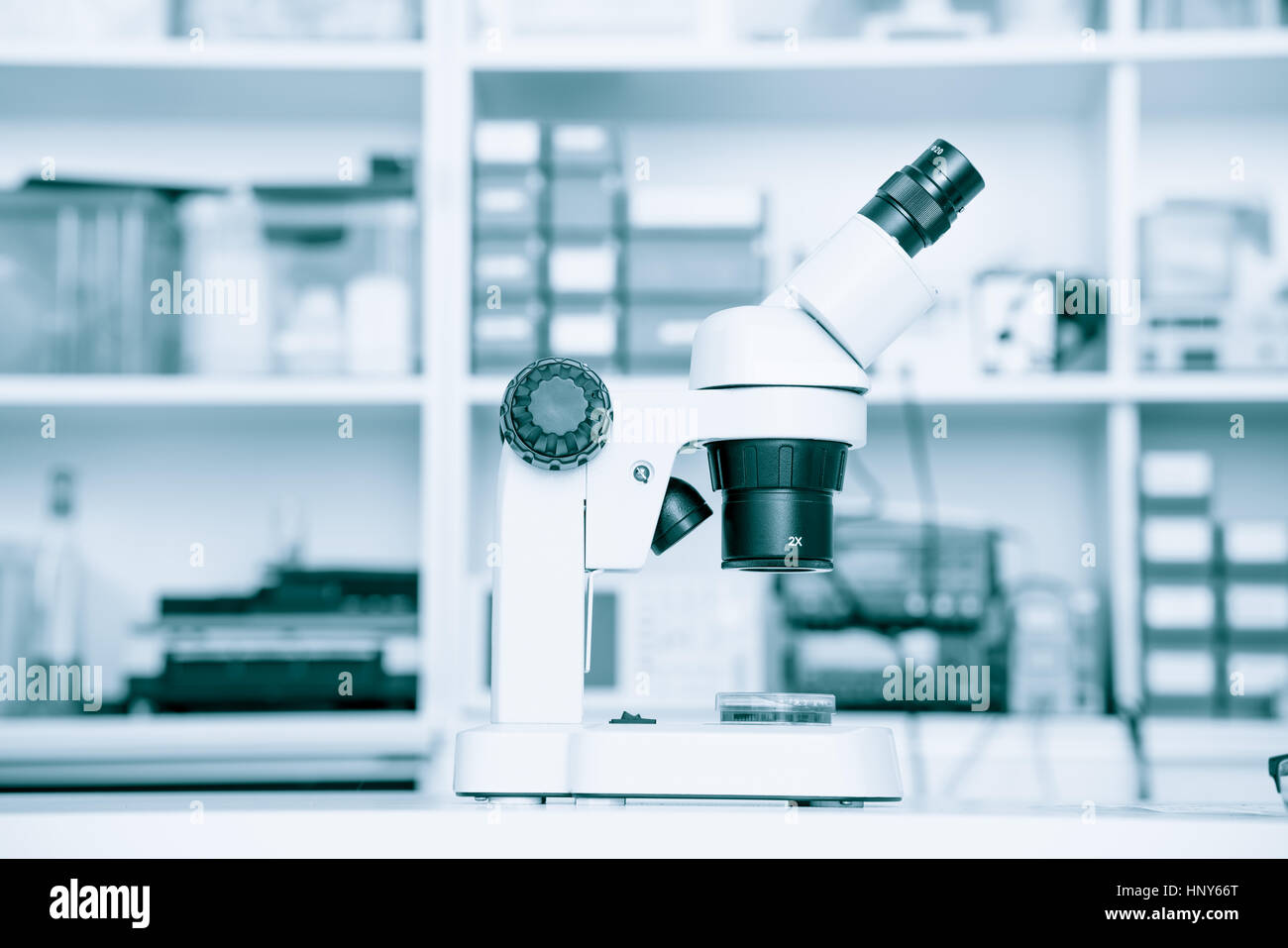 Science laboratory with a microscope, biological material samples and a ...