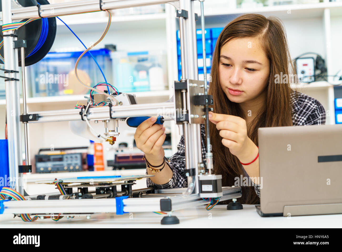 girl in robotics class research electronic device Stock Photo - Alamy