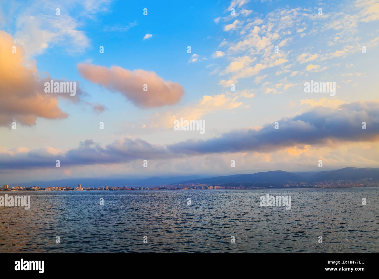 Beautiful morning seascape. Bright blue sky with cumulus clouds and a ...