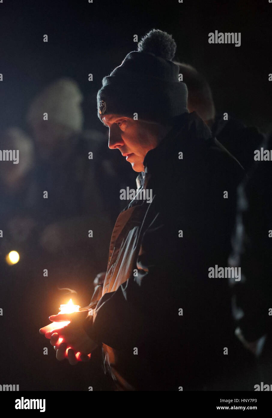 The crowd holding candles, listens as Sinn Fein's new leader at ...