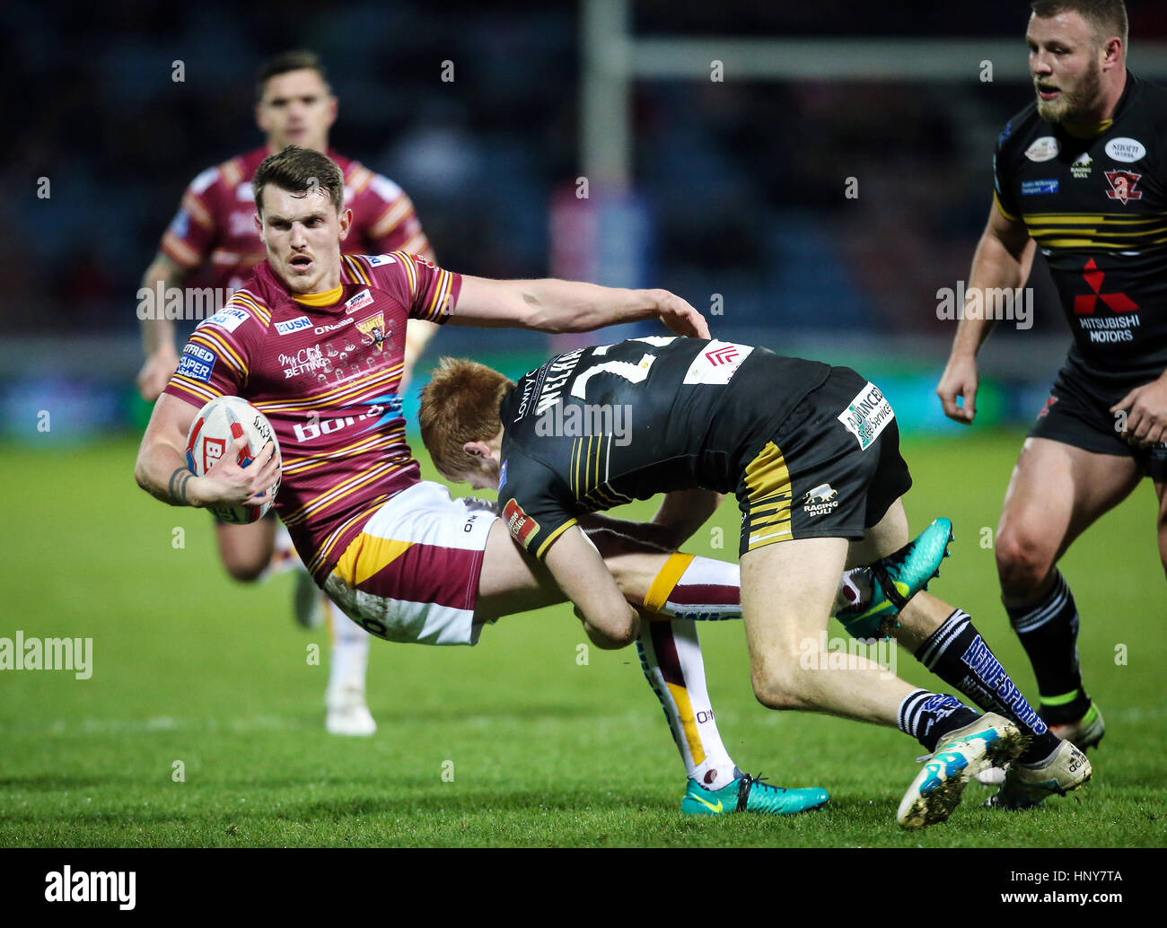 Salford Red Devils' Kris Welham tackles Huddersfield Giants' Lee ...