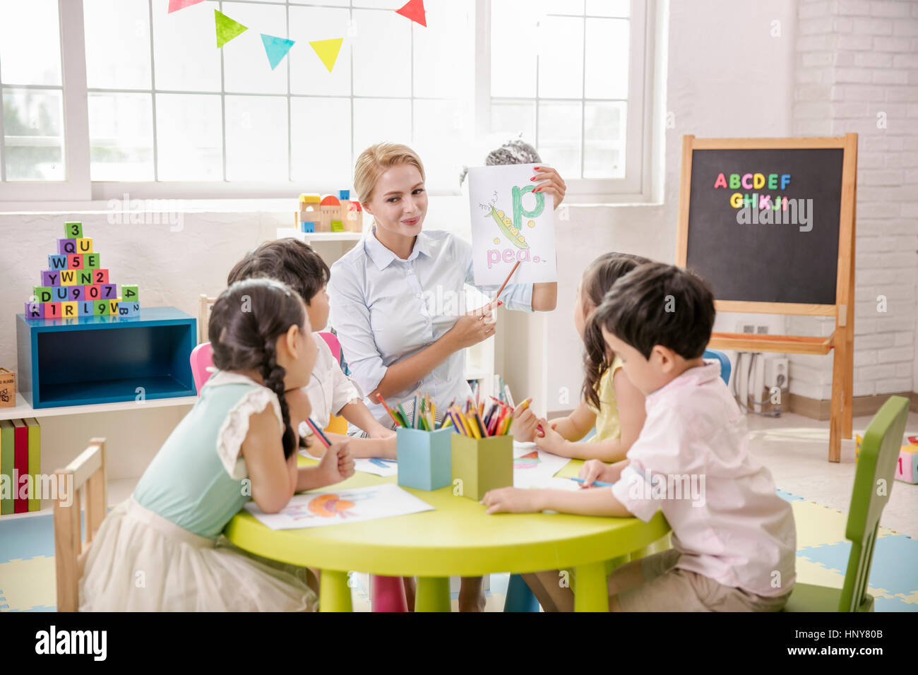 English class at kindergarten Stock Photo - Alamy