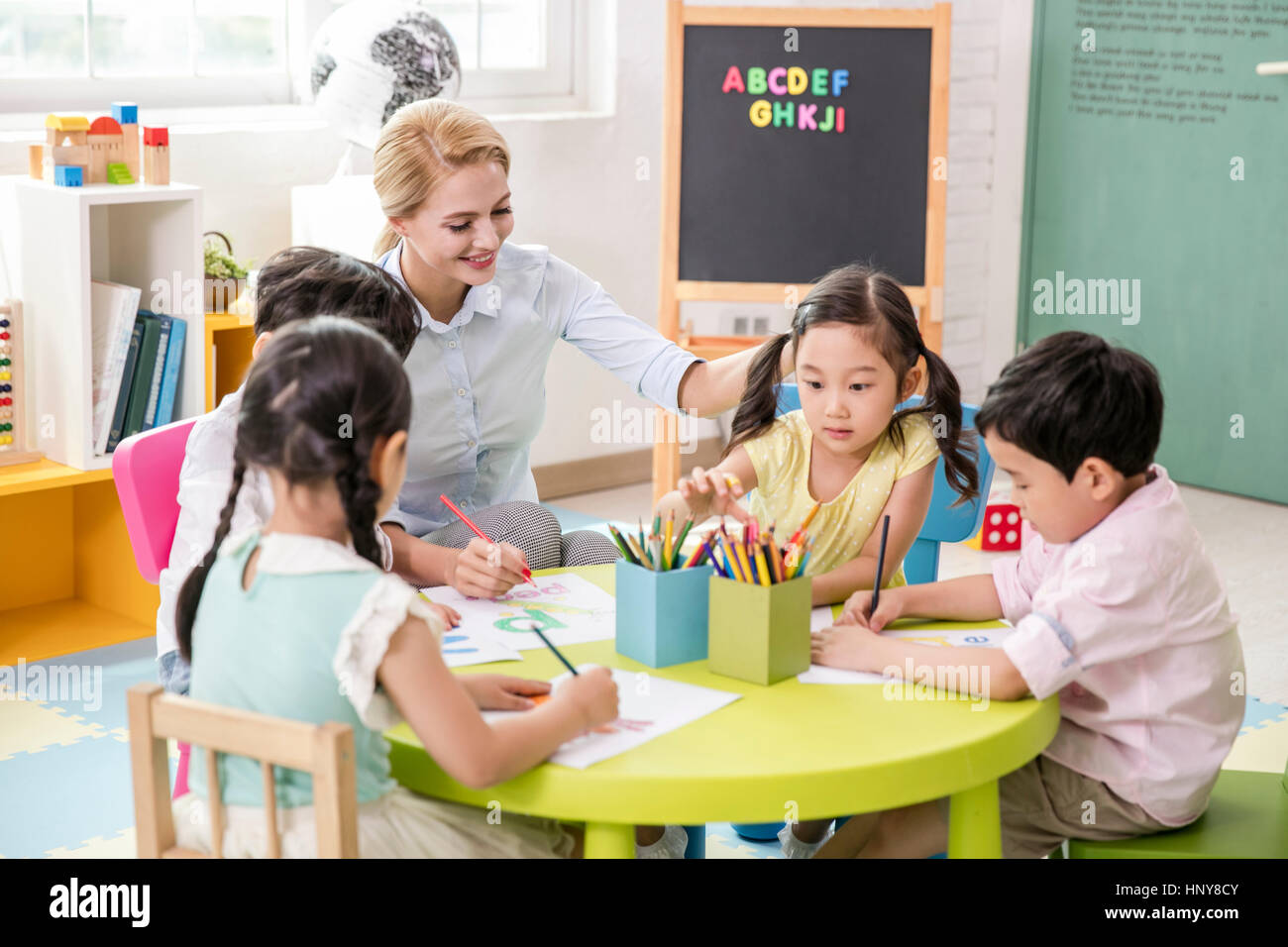 English class at kindergarten indoors hi-res stock photography and ...