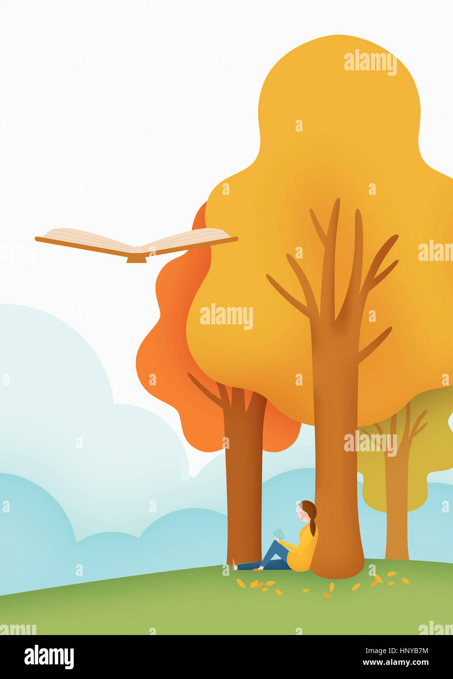 Woman reading book under tree in autumn Stock Photo - Alamy