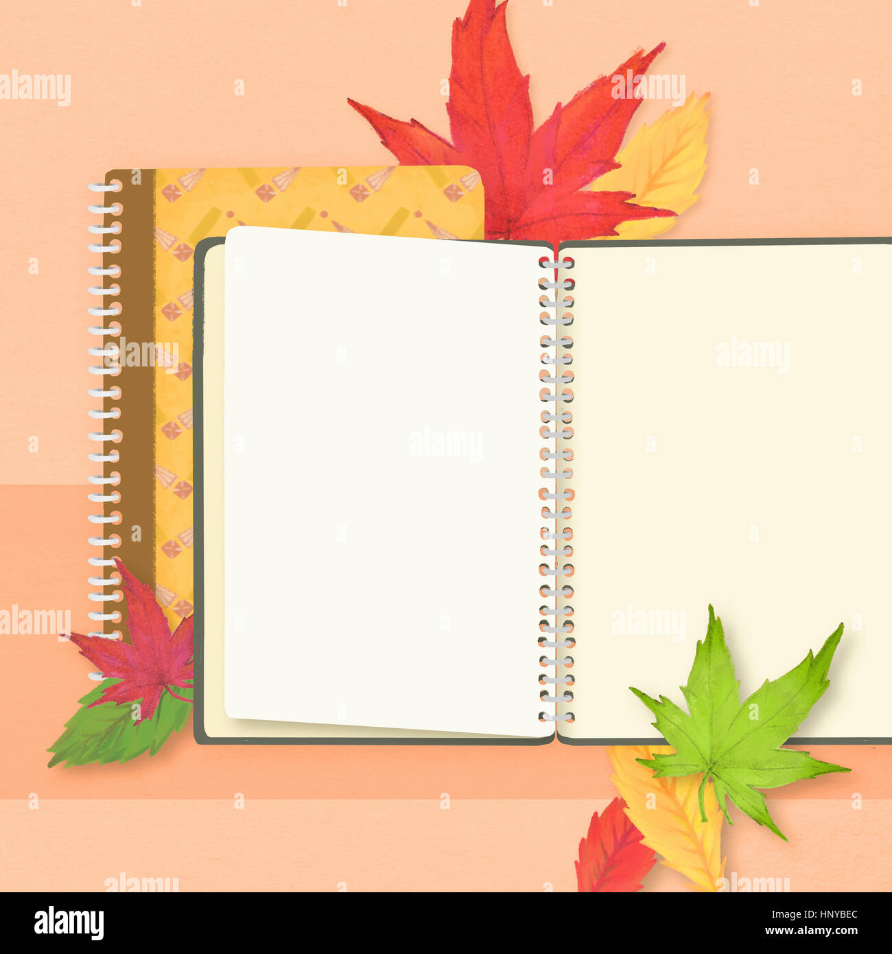 Notebook with autumn leaves Stock Photo - Alamy