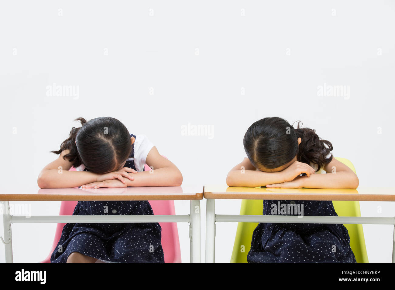 Tired twin girls people hi-res stock photography and images - Alamy