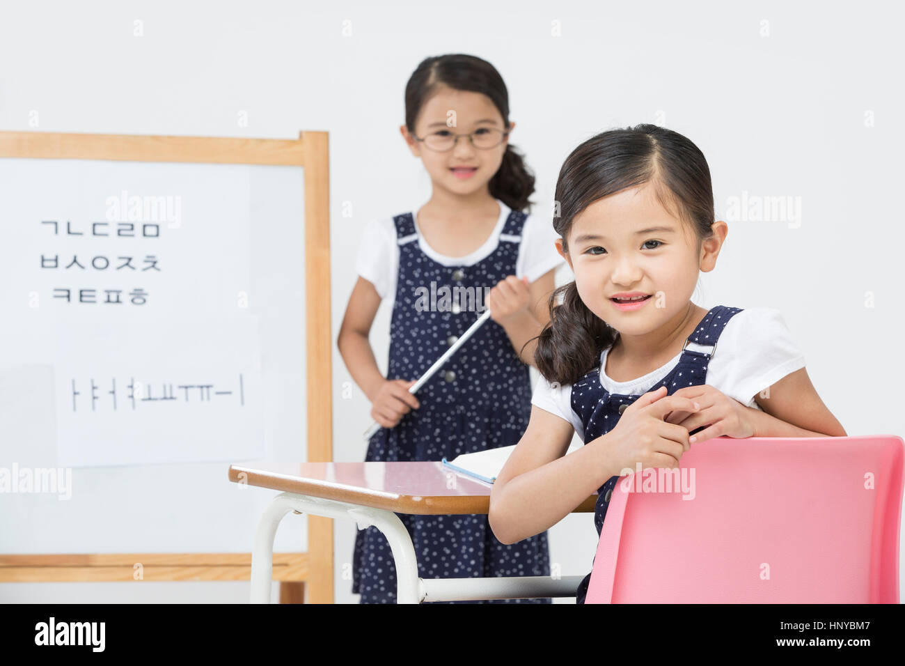 Twin girls at class people hi-res stock photography and images - Alamy
