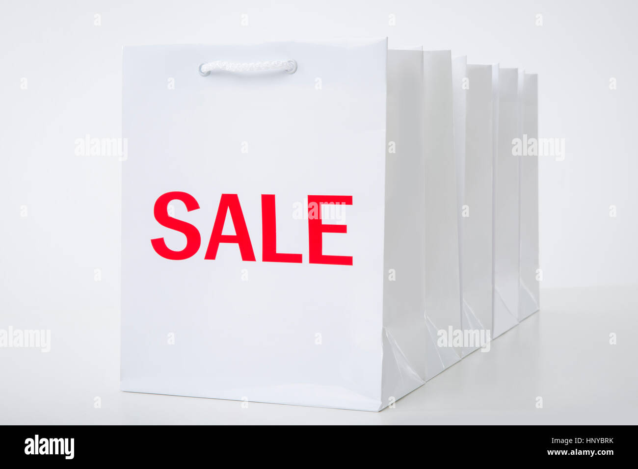 Shopping bags with sale sign Stock Photo - Alamy