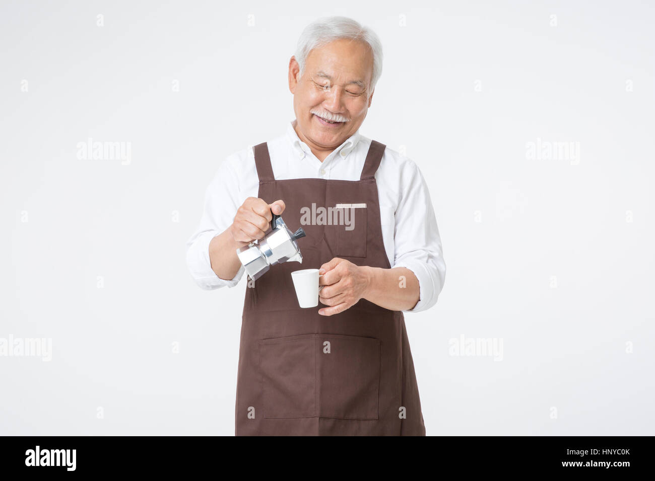 Asian barista pouring coffee hi-res stock photography and images - Alamy