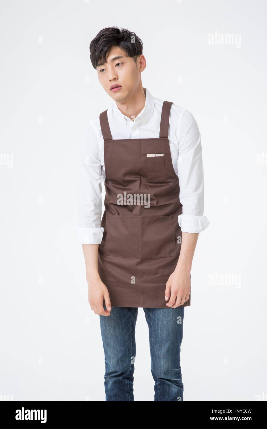 Young tired male barista people hi-res stock photography and images - Alamy