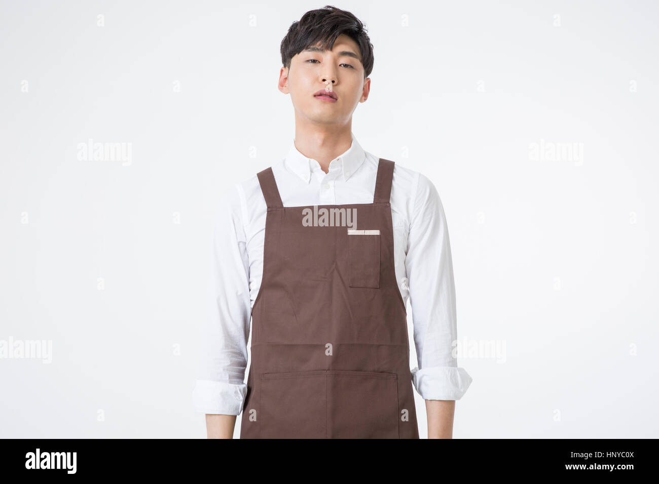 Young tired male barista Stock Photo - Alamy