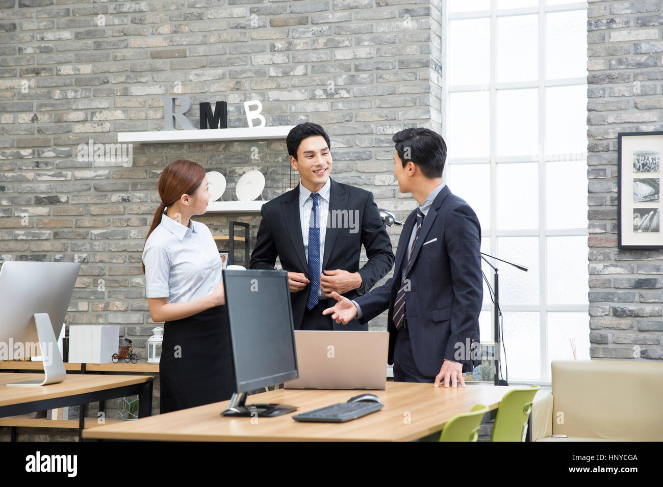 Business people smiling each other hi-res stock photography and images ...