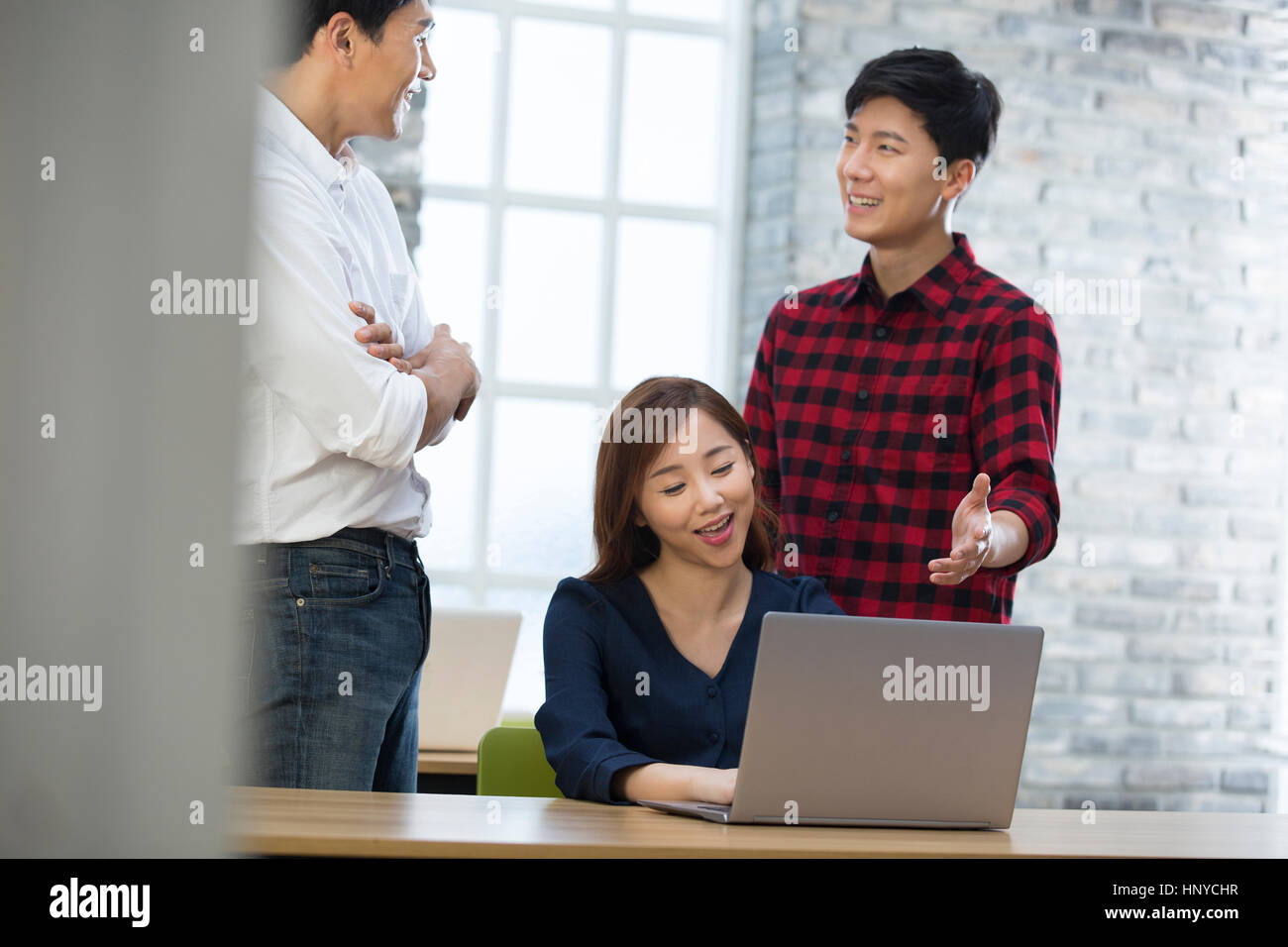 Business people smiling each other hi-res stock photography and images ...