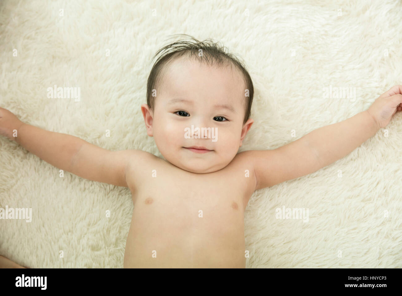 Portrait of smiling baby boy Stock Photo - Alamy