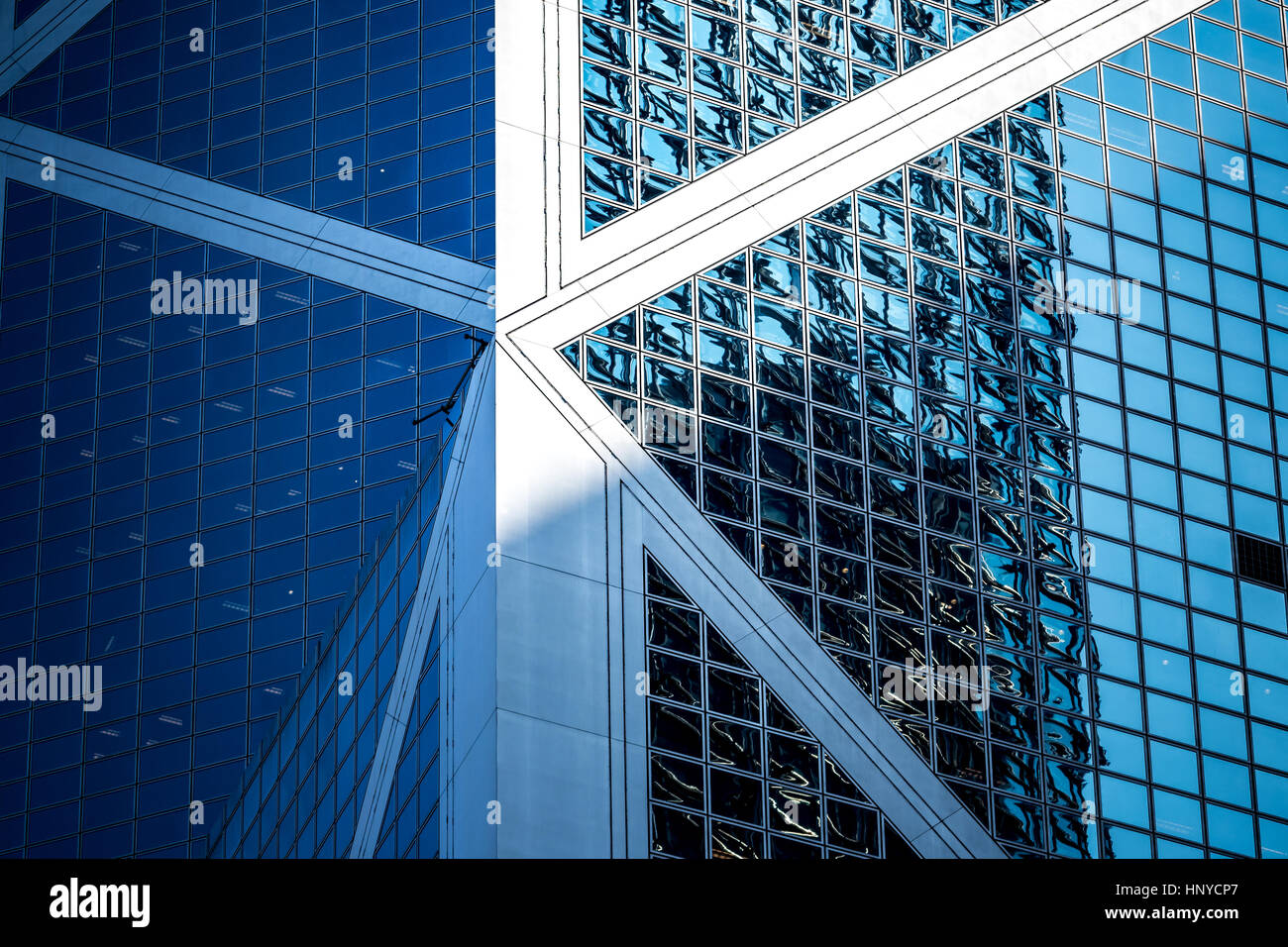 Windows of commercial building in Hong Kong Stock Photo - Alamy