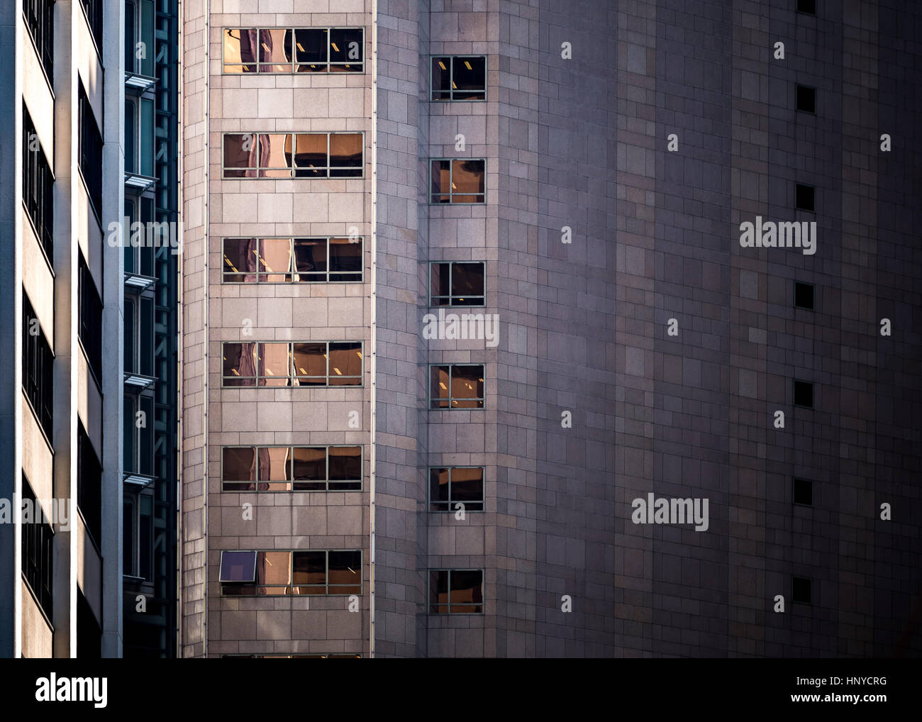 Windows of commercial building in Hong Kong Stock Photo - Alamy