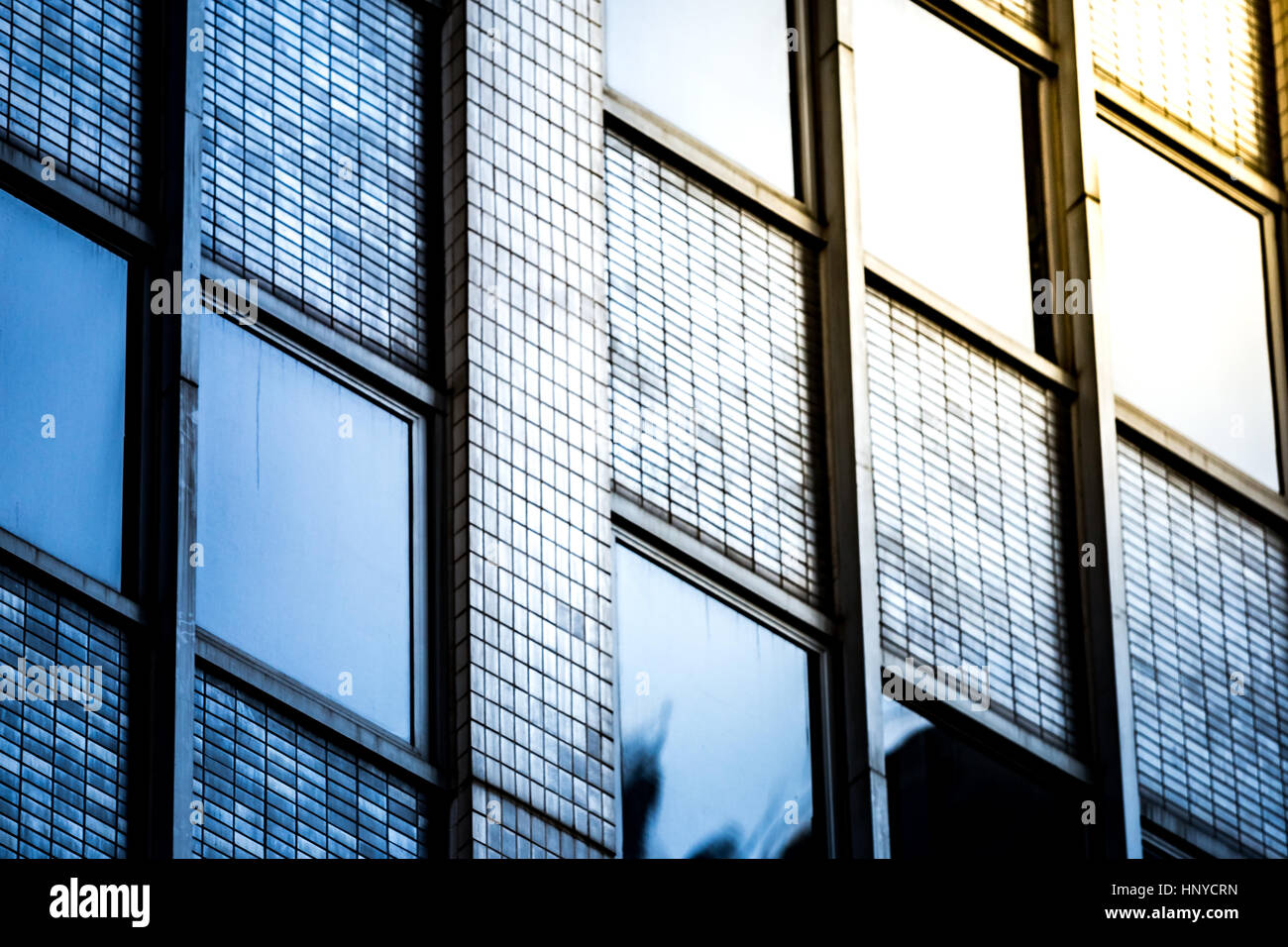 Windows of commercial building in Hong Kong Stock Photo - Alamy