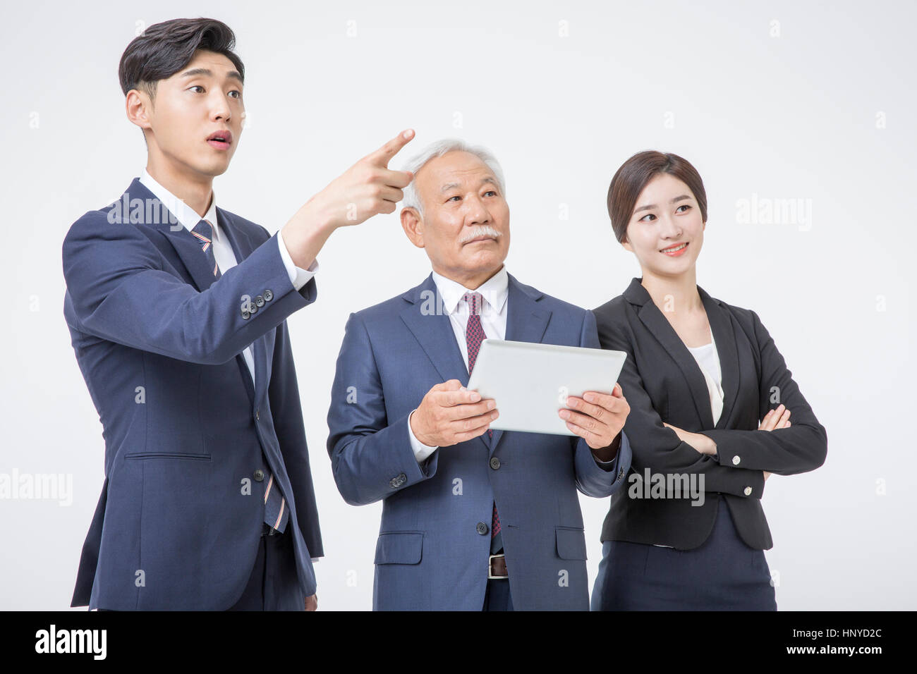 In suits hi-res stock photography and images - Alamy