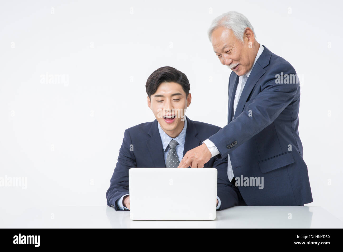Smiling businessmen hi-res stock photography and images - Alamy