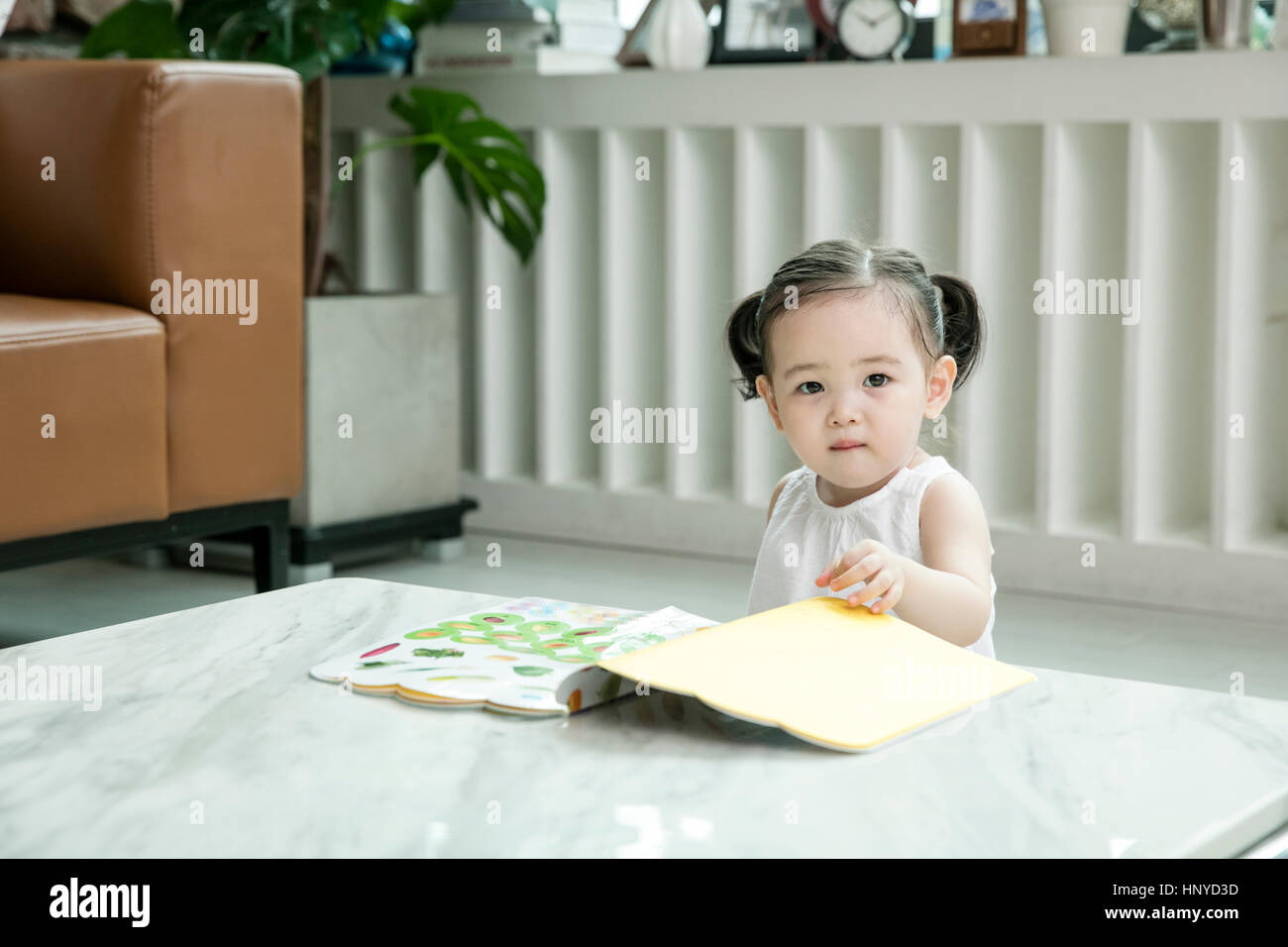 Smiling baby girl learning hi-res stock photography and images - Alamy