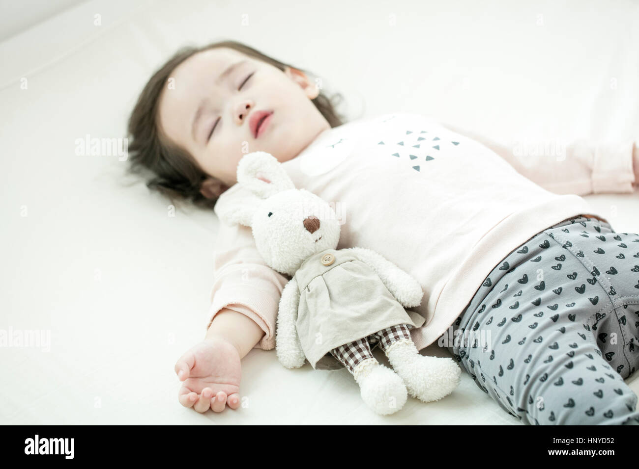 Doll lying down hi-res stock photography and images - Alamy