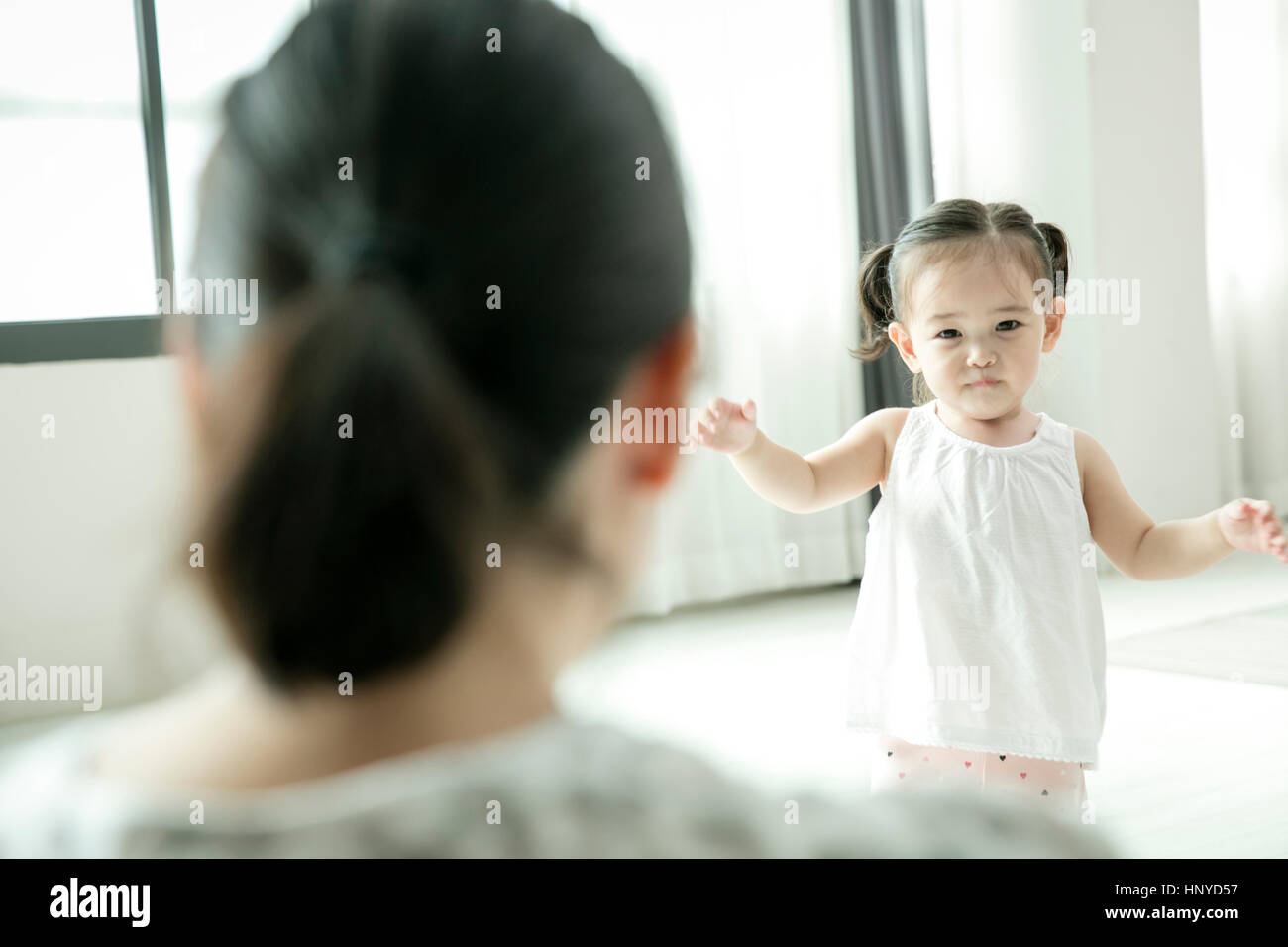Baby toddling hi-res stock photography and images - Alamy