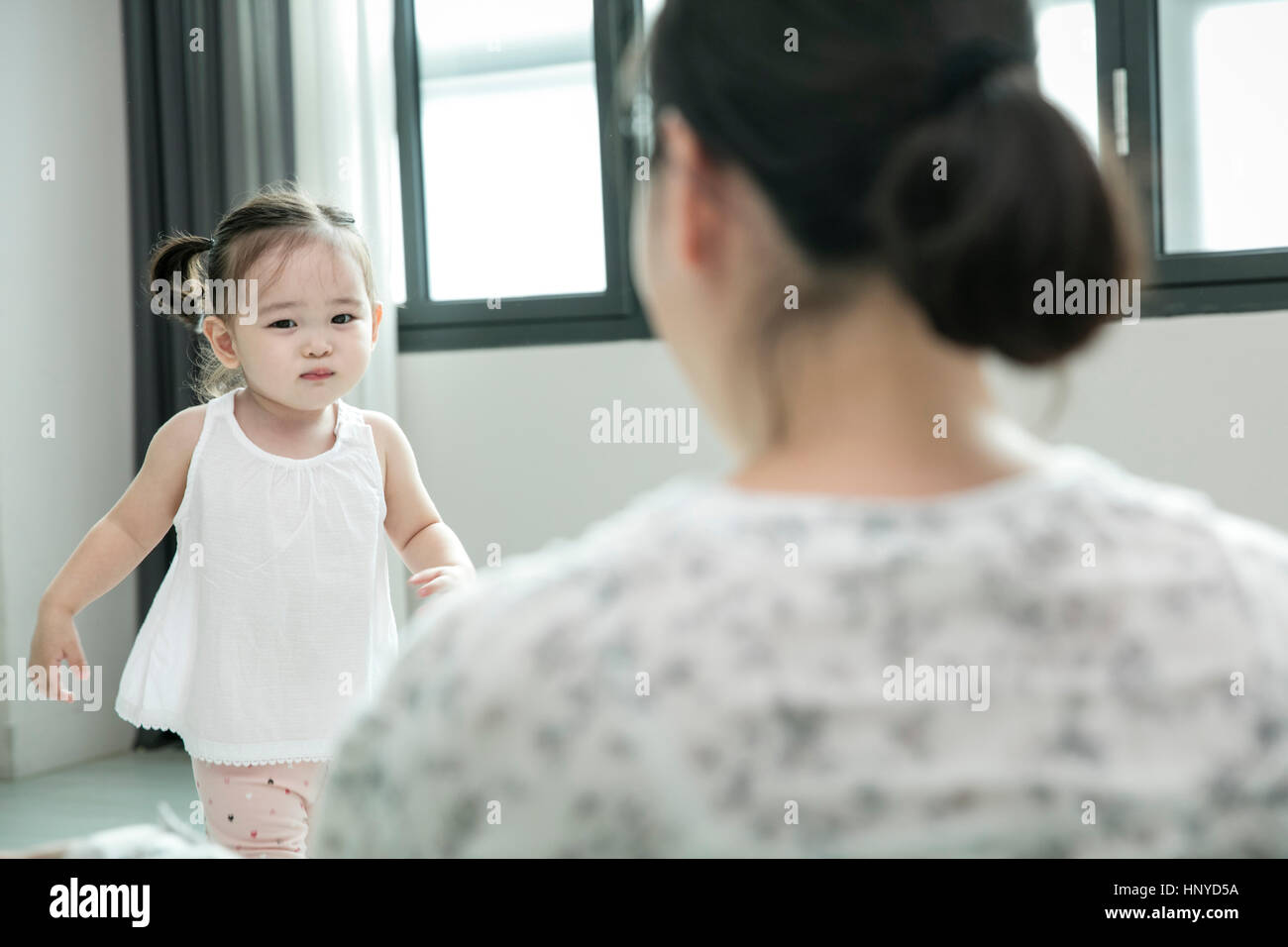 Baby toddling hi-res stock photography and images - Alamy