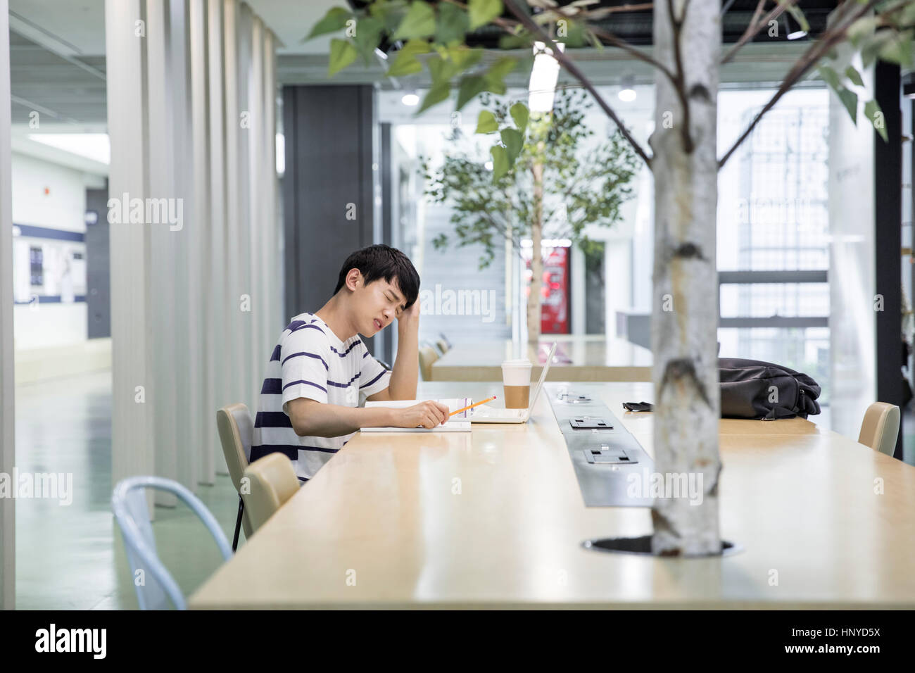 Male college student thinking Stock Photo - Alamy Male college student thinking Stock Photo - Alamy