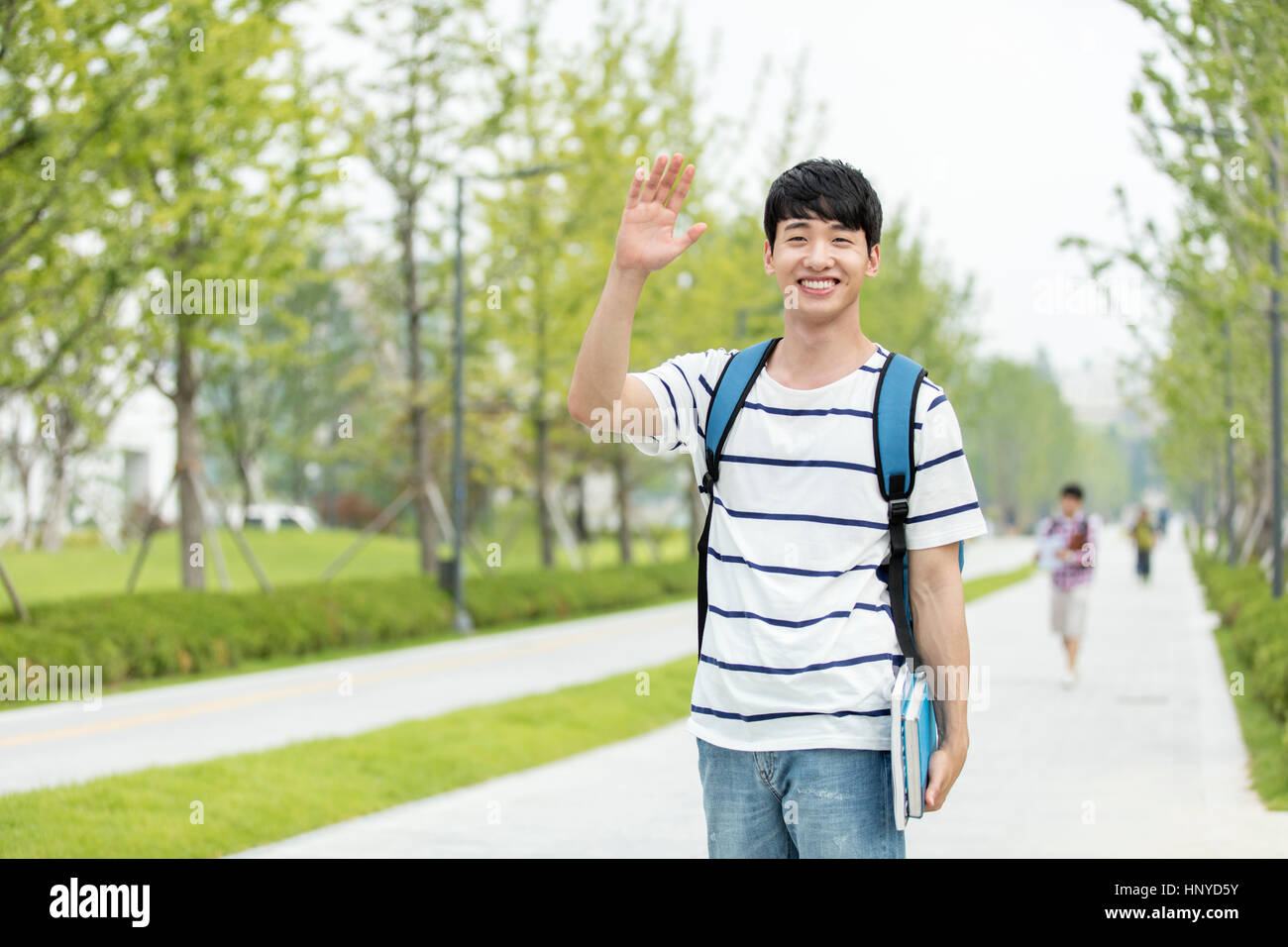 Hand lifting backpack hi-res stock photography and images - Alamy