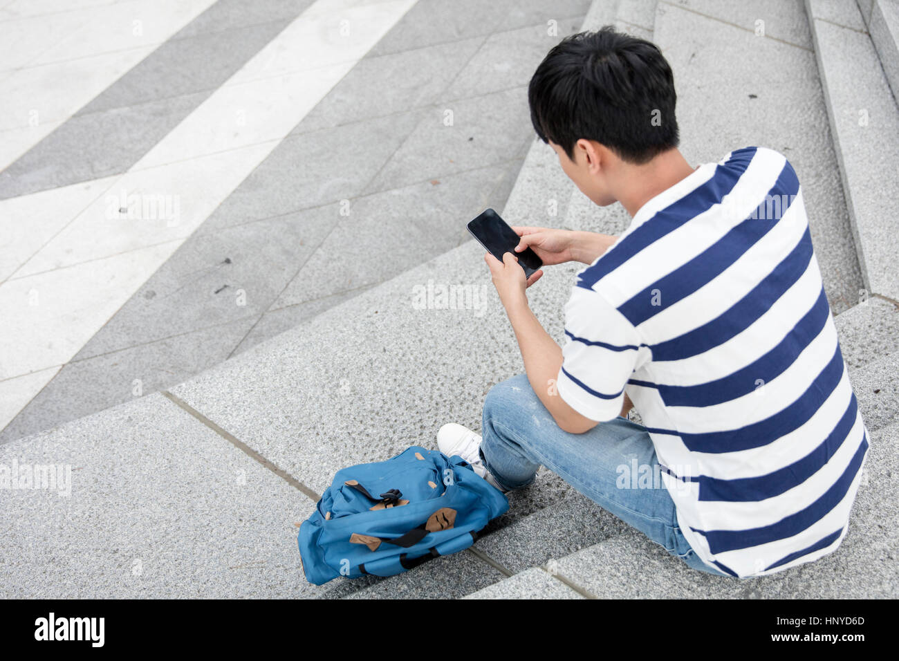 Back of male college student Stock Photo - Alamy