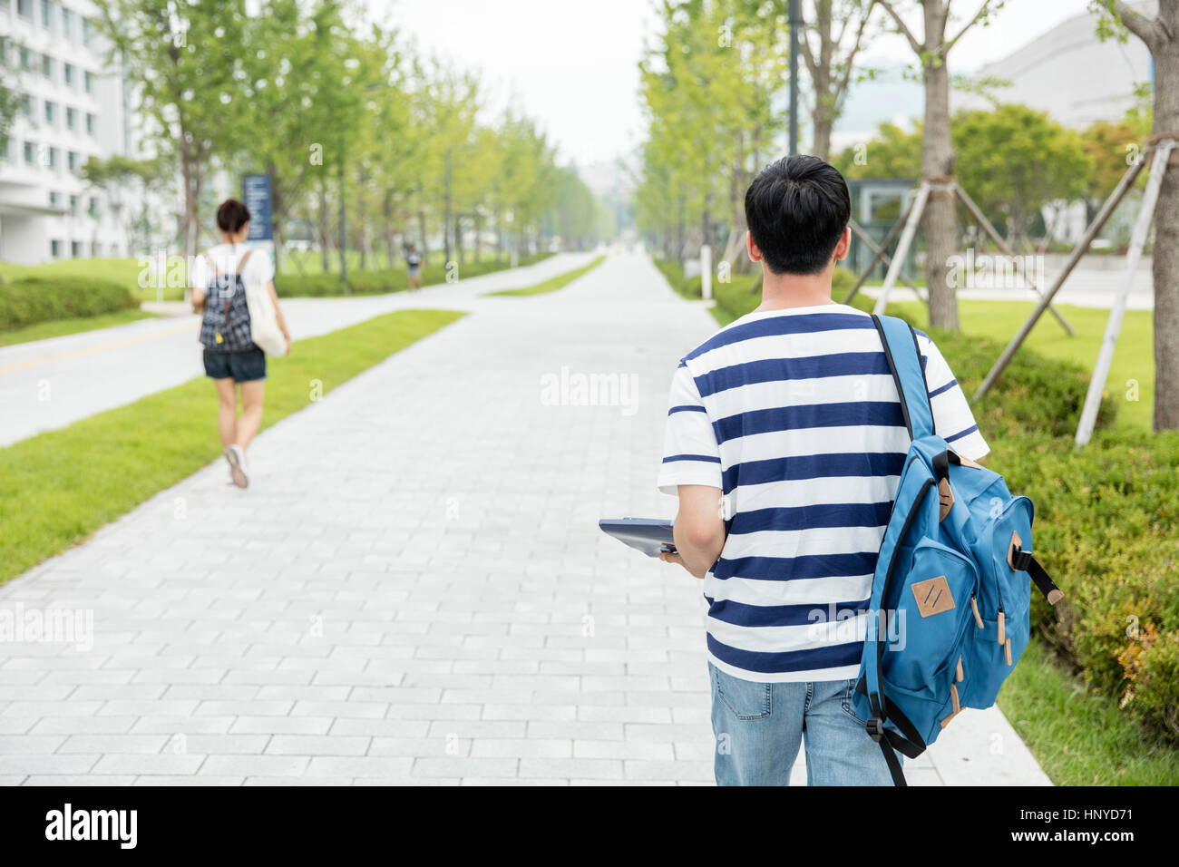 Schoolboy back walking hi-res stock photography and images - Alamy