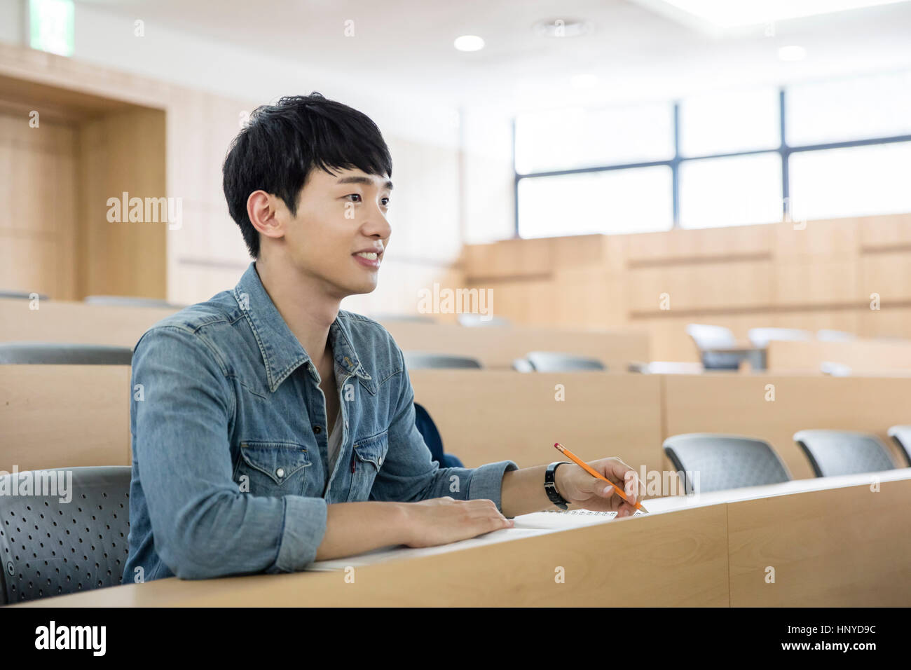 Side view portrait of male college student Stock Photo - Alamy
