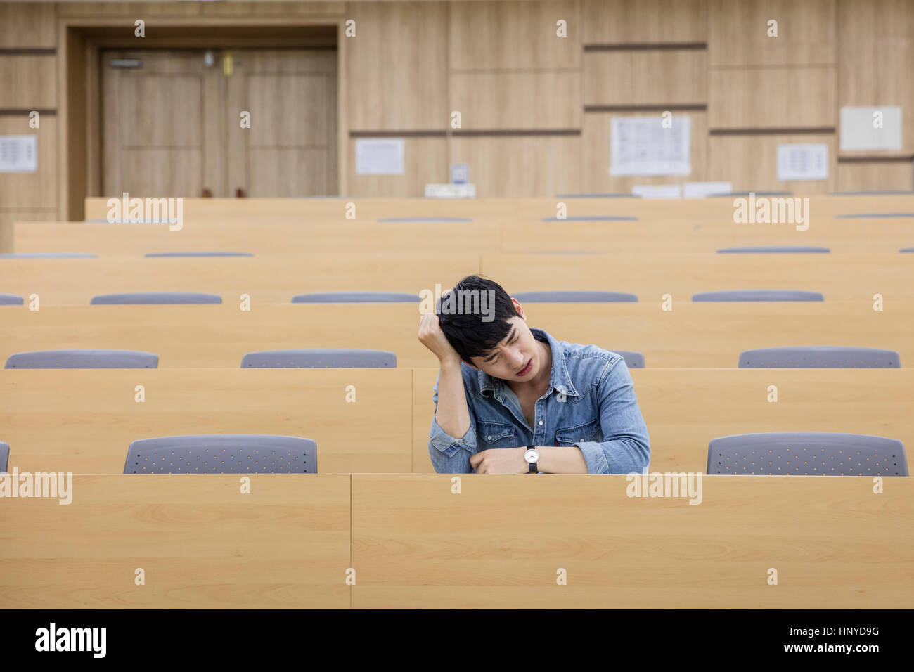 Portrait of male college student depressed Stock Photo - Alamy
