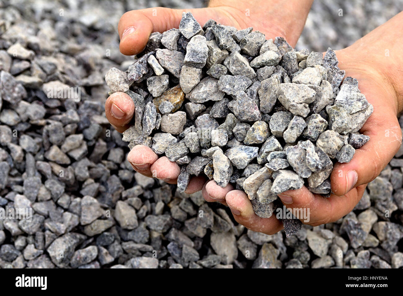 Hand holding stone beach hi-res stock photography and images - Alamy