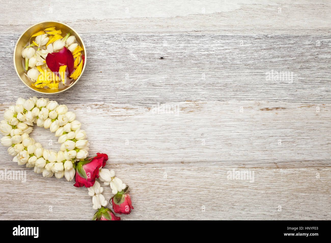 Songkran Festival : Perfume,Garland,floral,power and gun on white ...