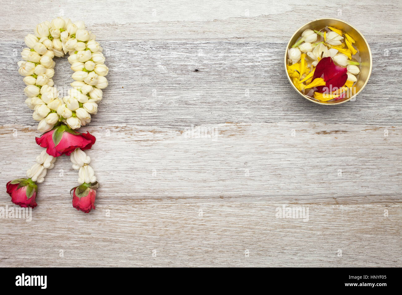 Songkran Festival : Perfume,Garland,floral,power and gun on white ...