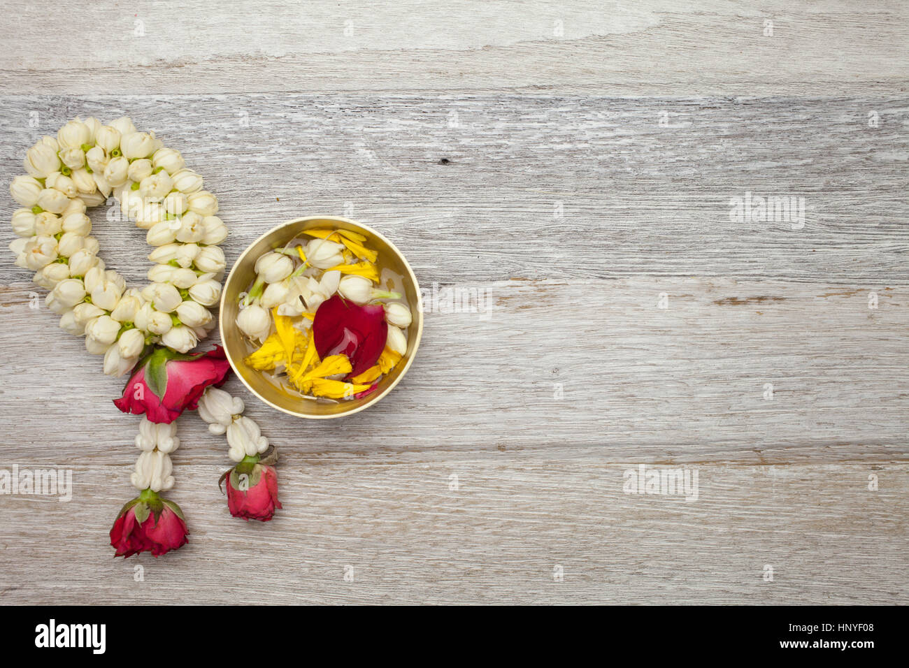 Songkran Festival : Perfume,Garland,floral,power and gun on white ...