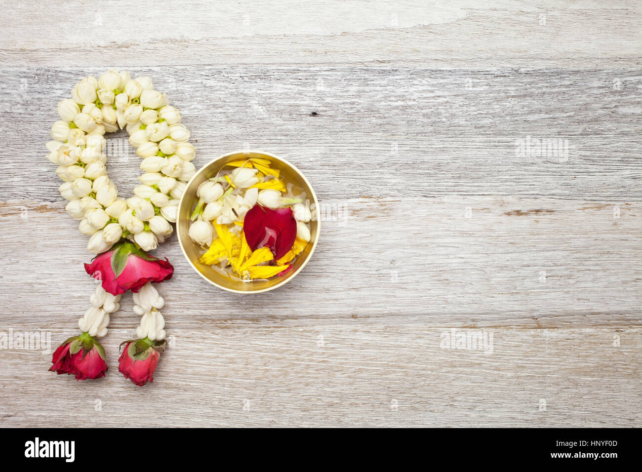 Songkran Festival : Perfume,Garland,floral,power and gun on white ...