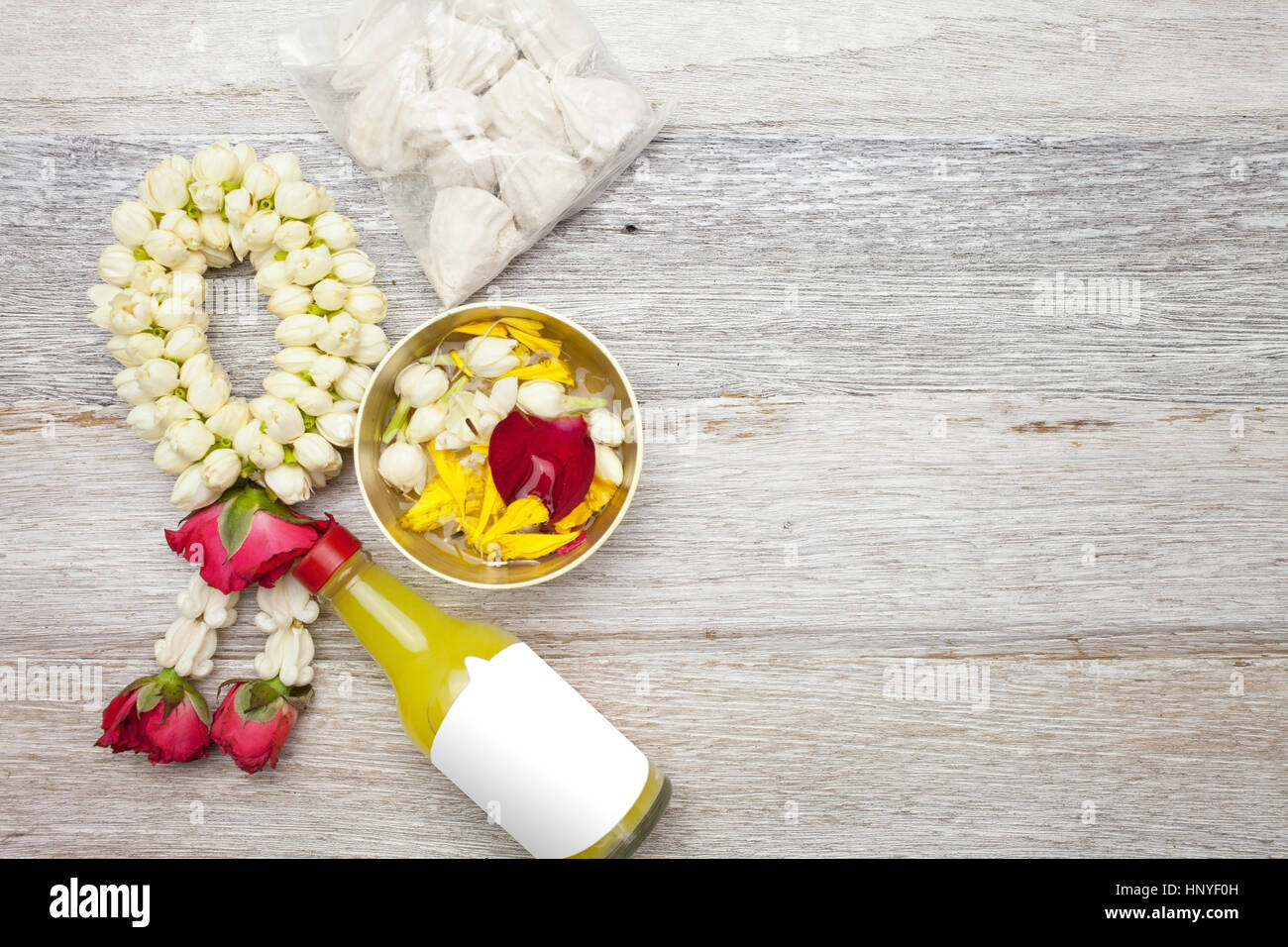Songkran Festival : Perfume,Garland,floral,power and gun on white ...