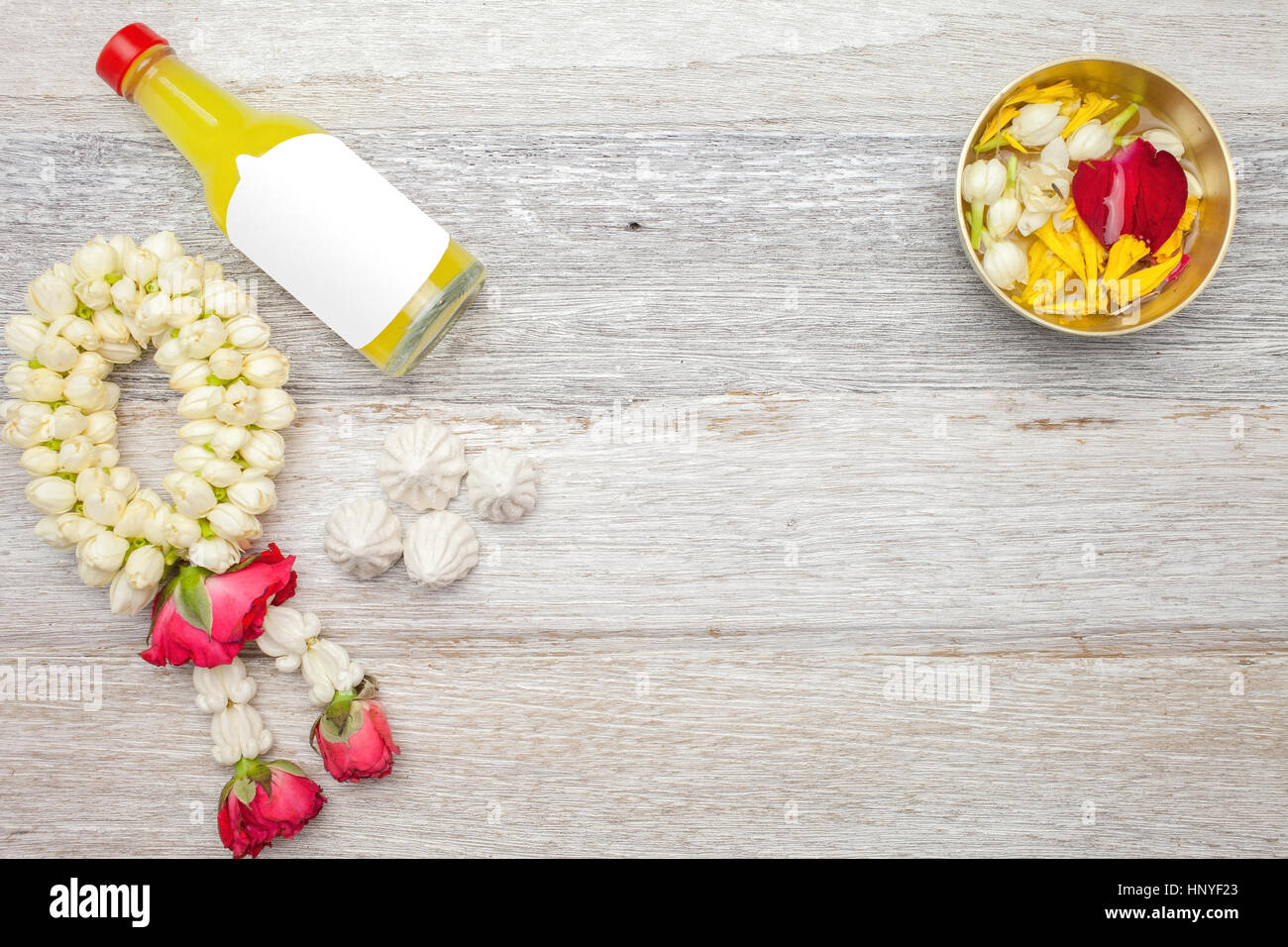 Songkran Festival : Perfume,Garland,floral,power and gun on white ...