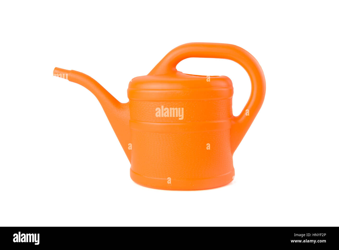 orange watering can on white background studio shot Stock Photo - Alamy