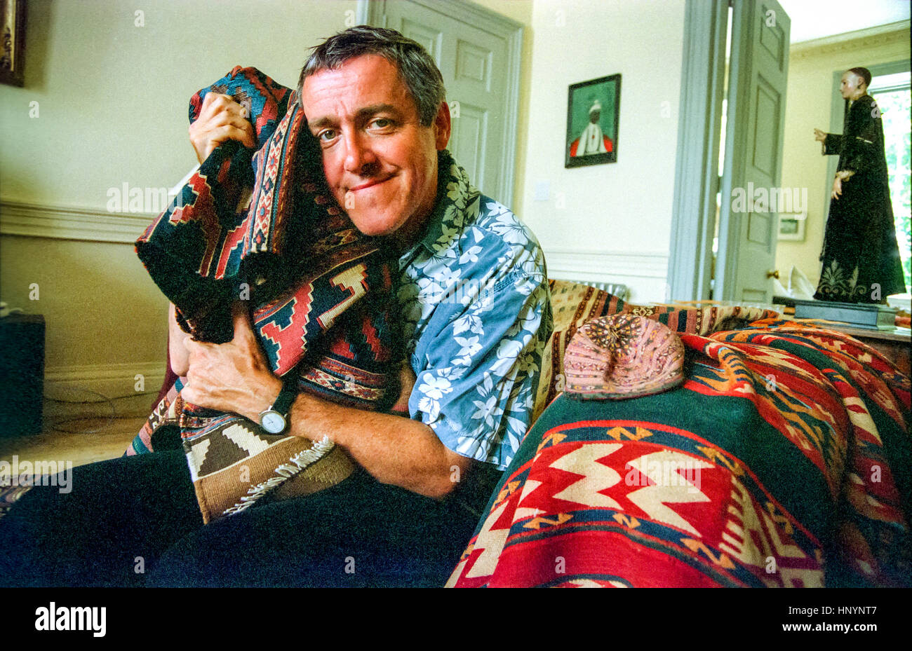 Griff Rhys-Jones at his home in Fitzroy Square, London, demonstrating ...