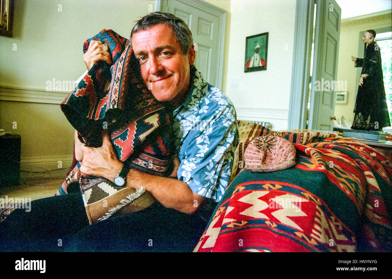 Griff Rhys-Jones at his home in Fitzroy Square, London, demonstrating ...