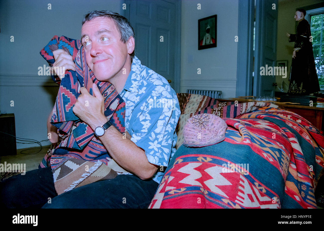 Griff Rhys-Jones at his home in Fitzroy Square, London, demonstrating ...