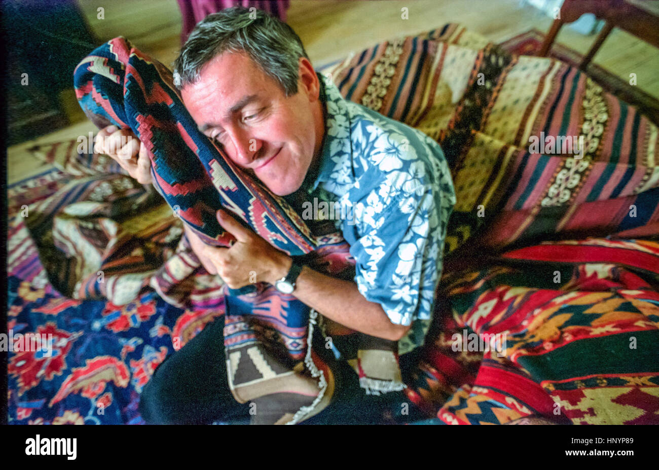 Griff Rhys-Jones at his home in Fitzroy Square, London, demonstrating ...