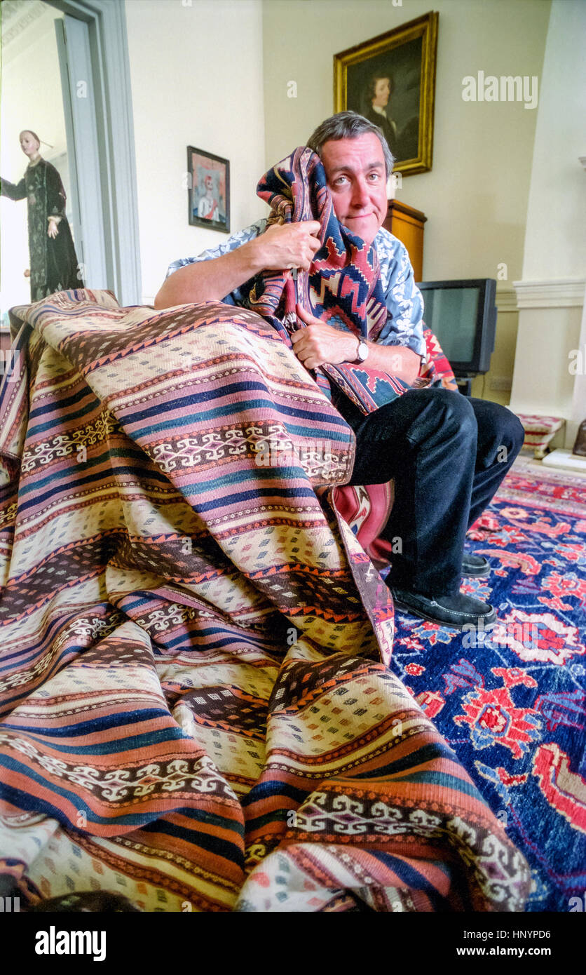Griff Rhys-Jones at his home in Fitzroy Square, London, demonstrating ...