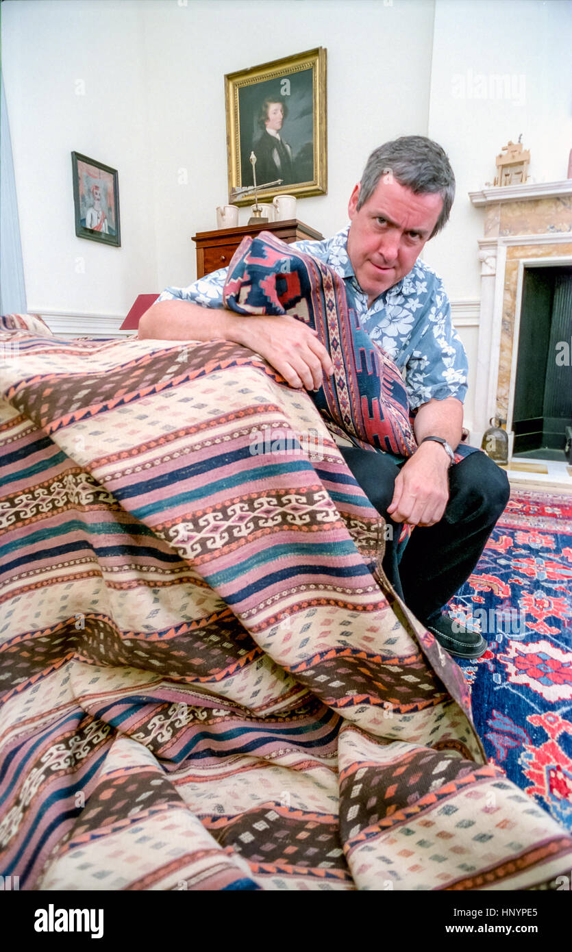 Griff Rhys-Jones at his home in Fitzroy Square, London, demonstrating ...