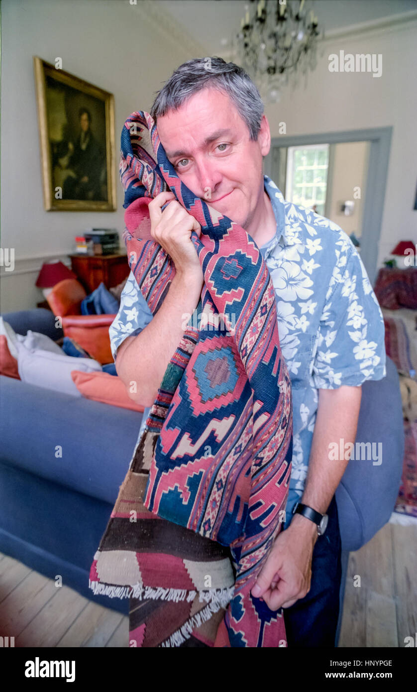 Griff Rhys-Jones at his home in Fitzroy Square, London, demonstrating ...